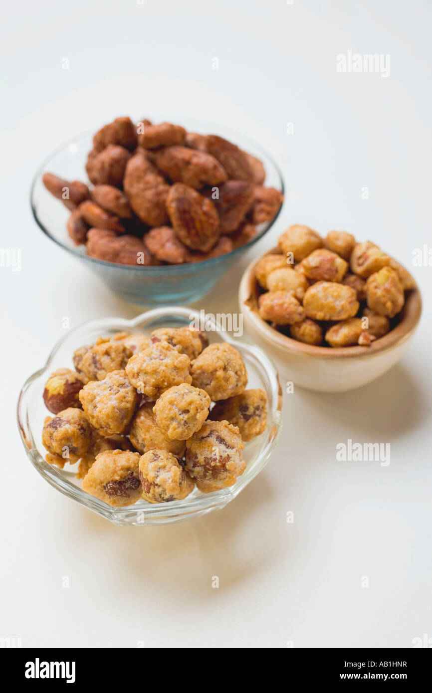 Assorted nuts to nibble in bowls FoodCollection Stock Photo - Alamy