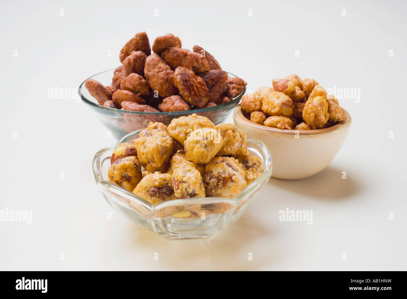 Assorted nuts to nibble in bowls FoodCollection Stock Photo - Alamy