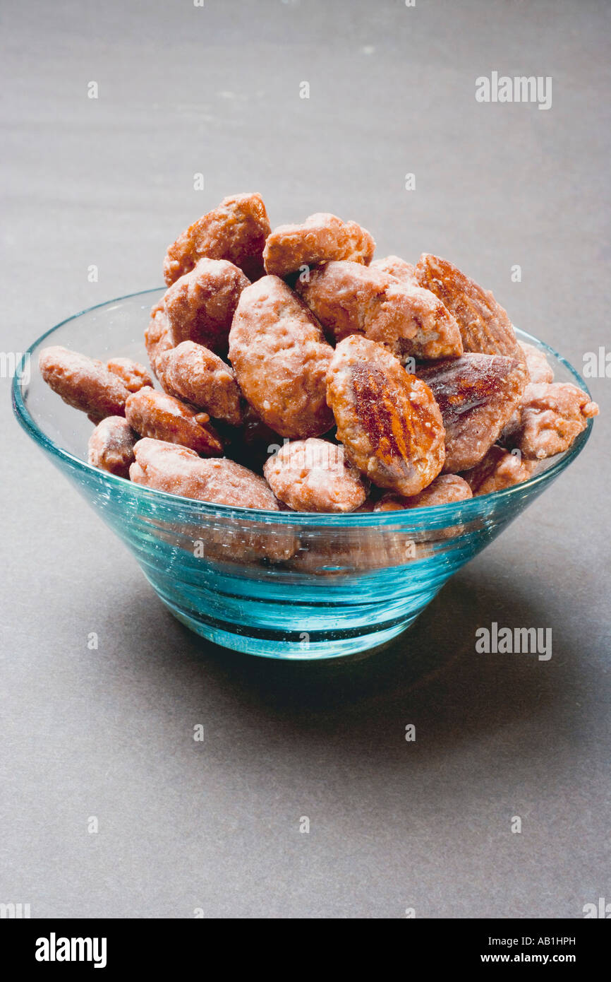 Assorted nuts to nibble in glass bowl FoodCollection Stock Photo - Alamy