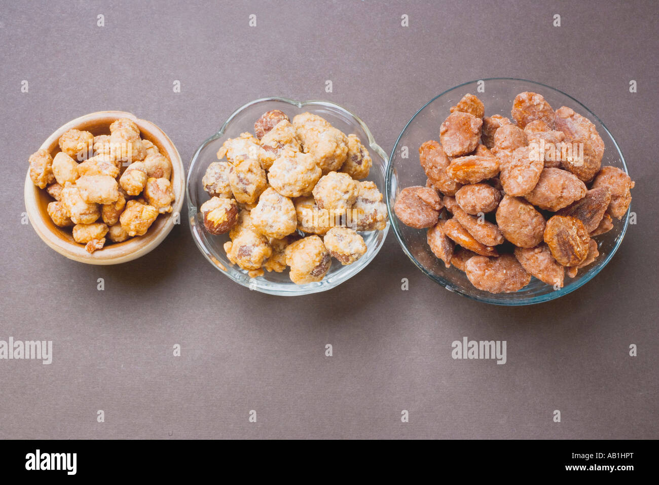 Assorted nuts to nibble in bowls FoodCollection Stock Photo - Alamy