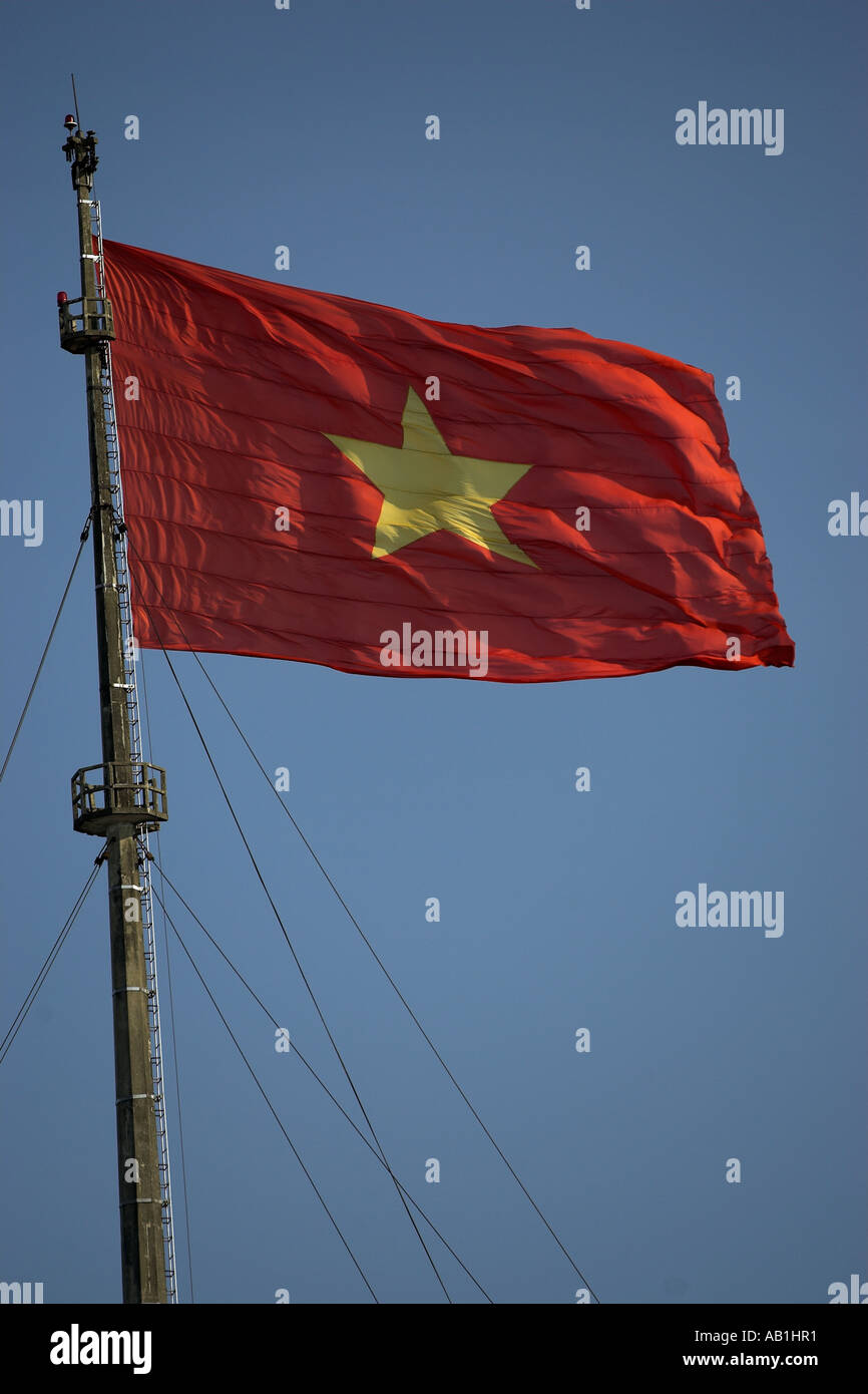 Red and yellow five point star national flag flying on the Flag Tower ...