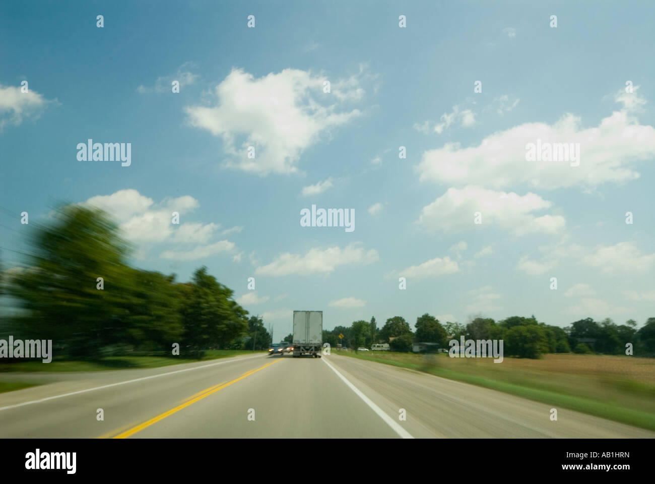 truck on highway through car window Stock Photo - Alamy