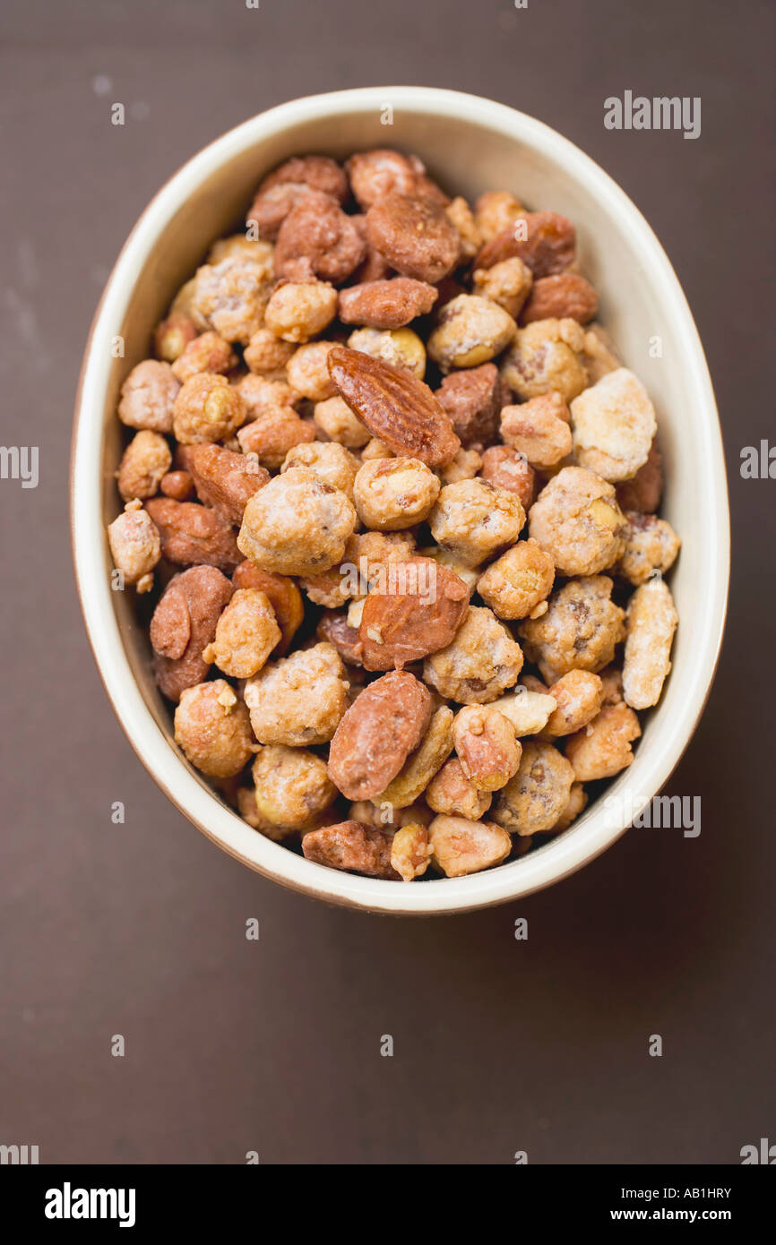 Mixed nuts to nibble in bowl FoodCollection Stock Photo - Alamy