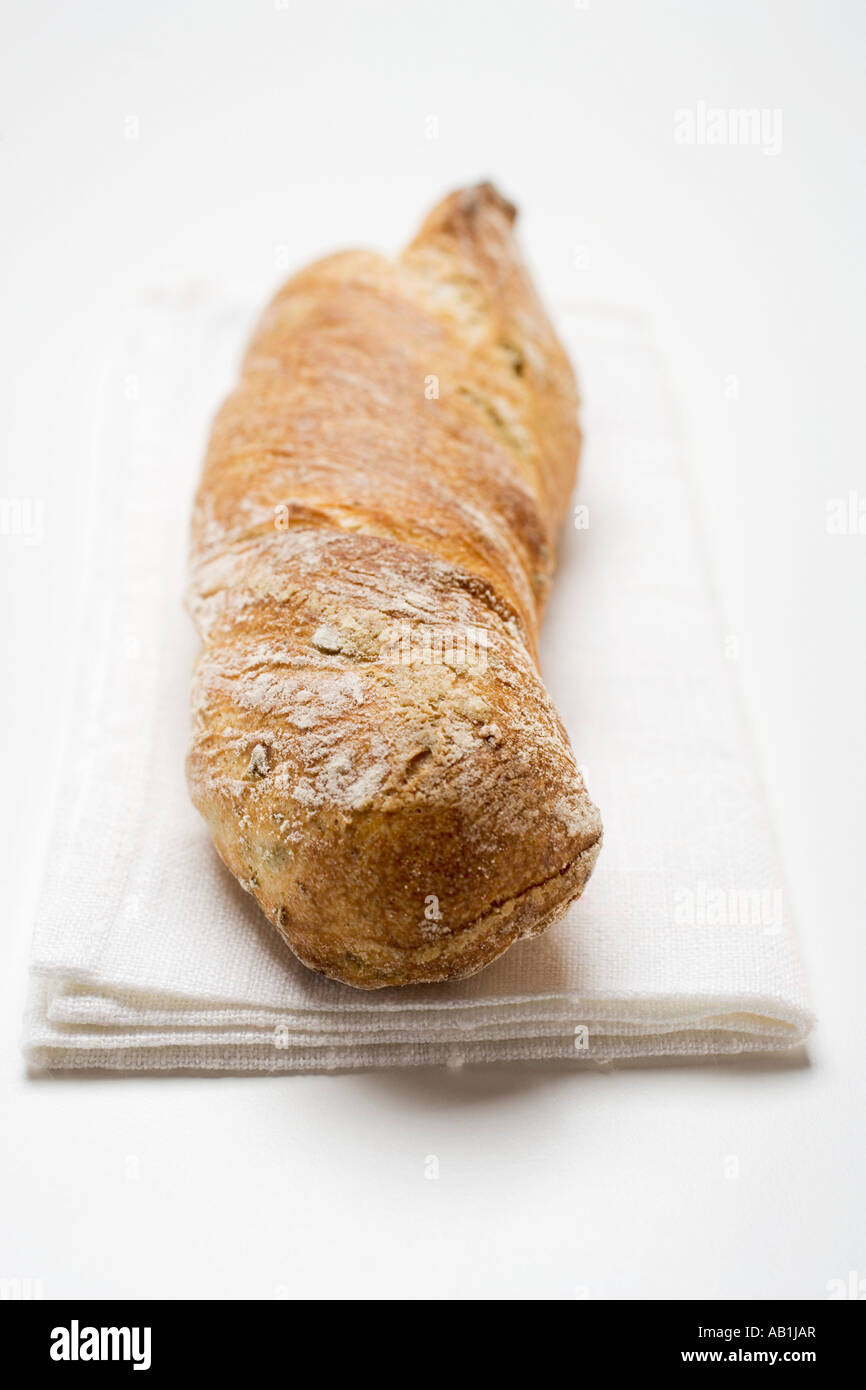 Rustic baguette on white cloth FoodCollection Stock Photo - Alamy