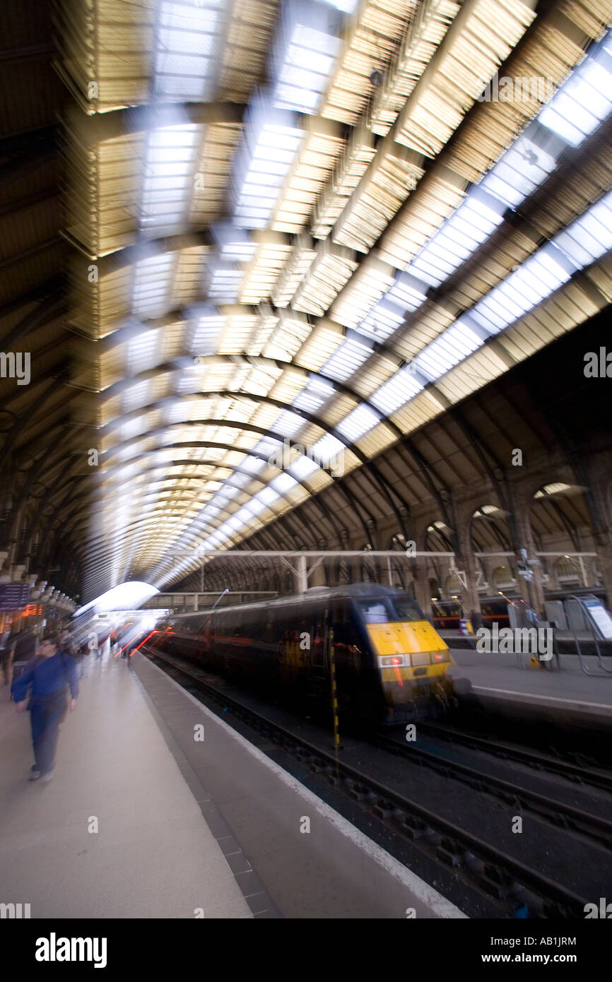 railway station with train at platform Stock Photo - Alamy