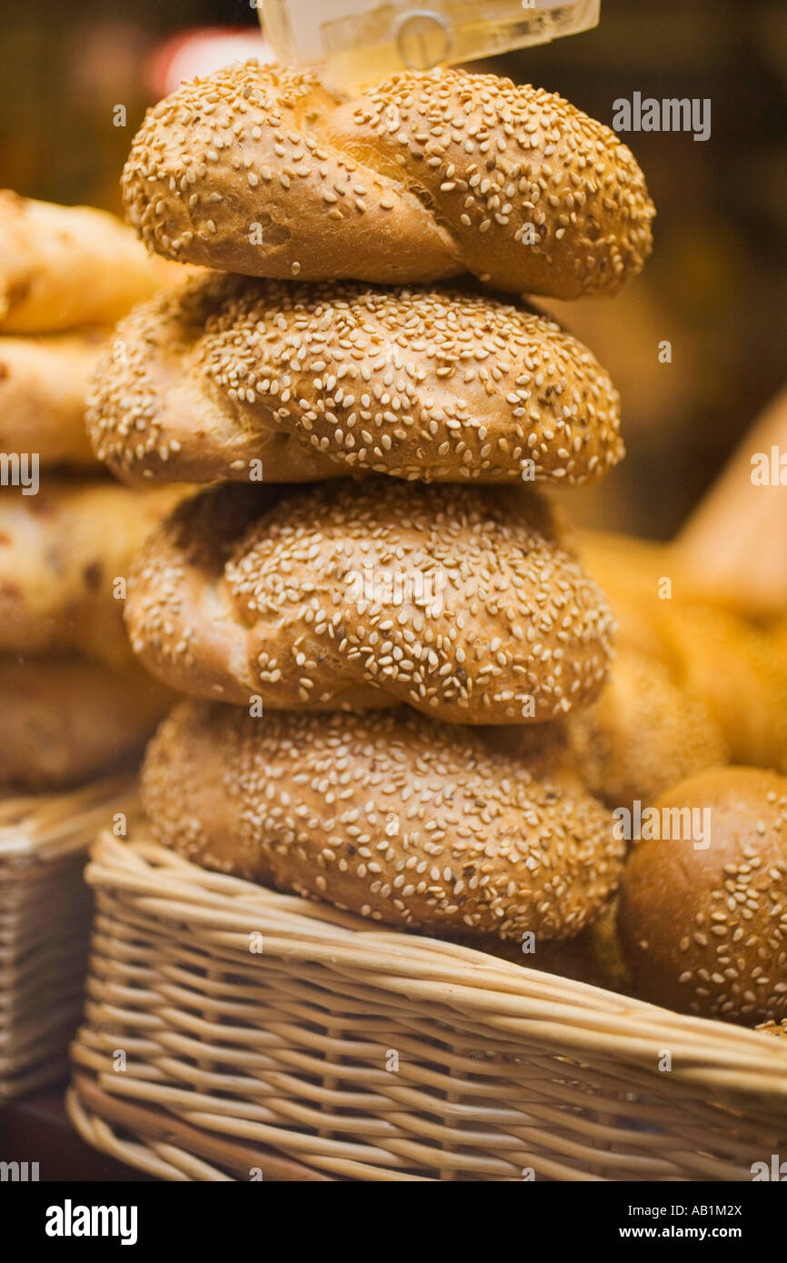 Assorted bread rolls in baskets at a market FoodCollection Stock Photo ...