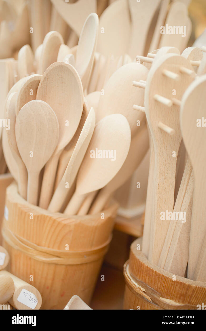 Wooden spoons in wooden buckets at a market FoodCollection Stock Photo ...