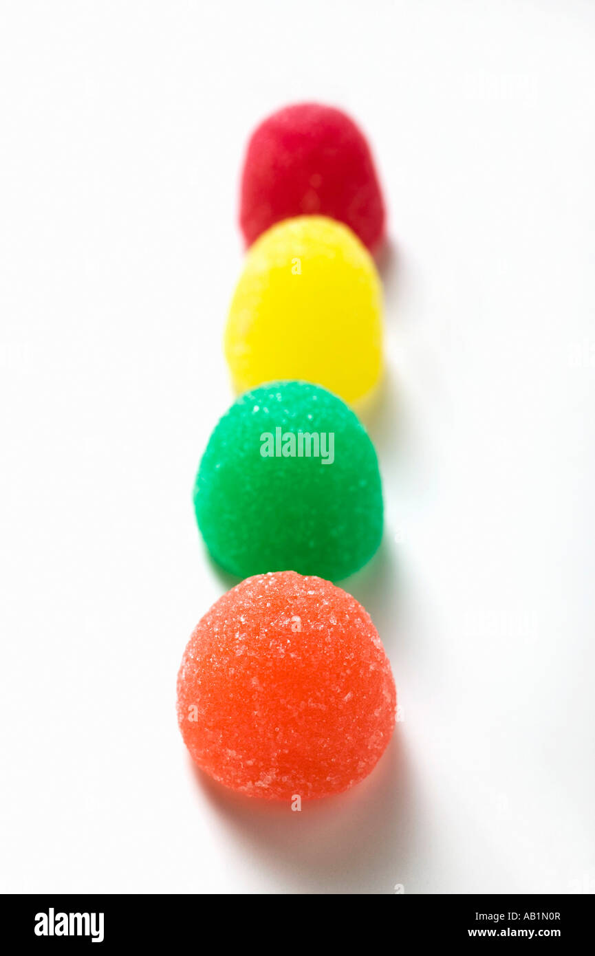 Row of coloured sweets hi-res stock photography and images - Alamy
