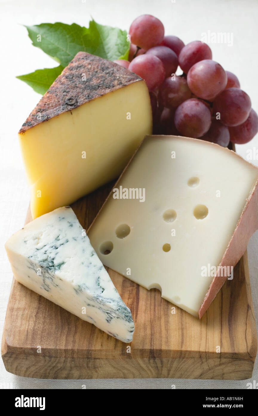Various types of cheese and red grapes FoodCollection Stock Photo - Alamy