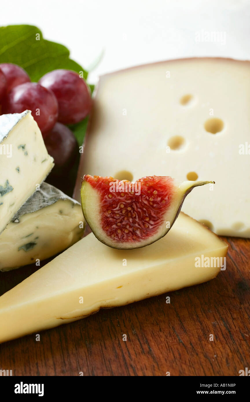 Cheese still life with fig and grapes FoodCollection Stock Photo - Alamy