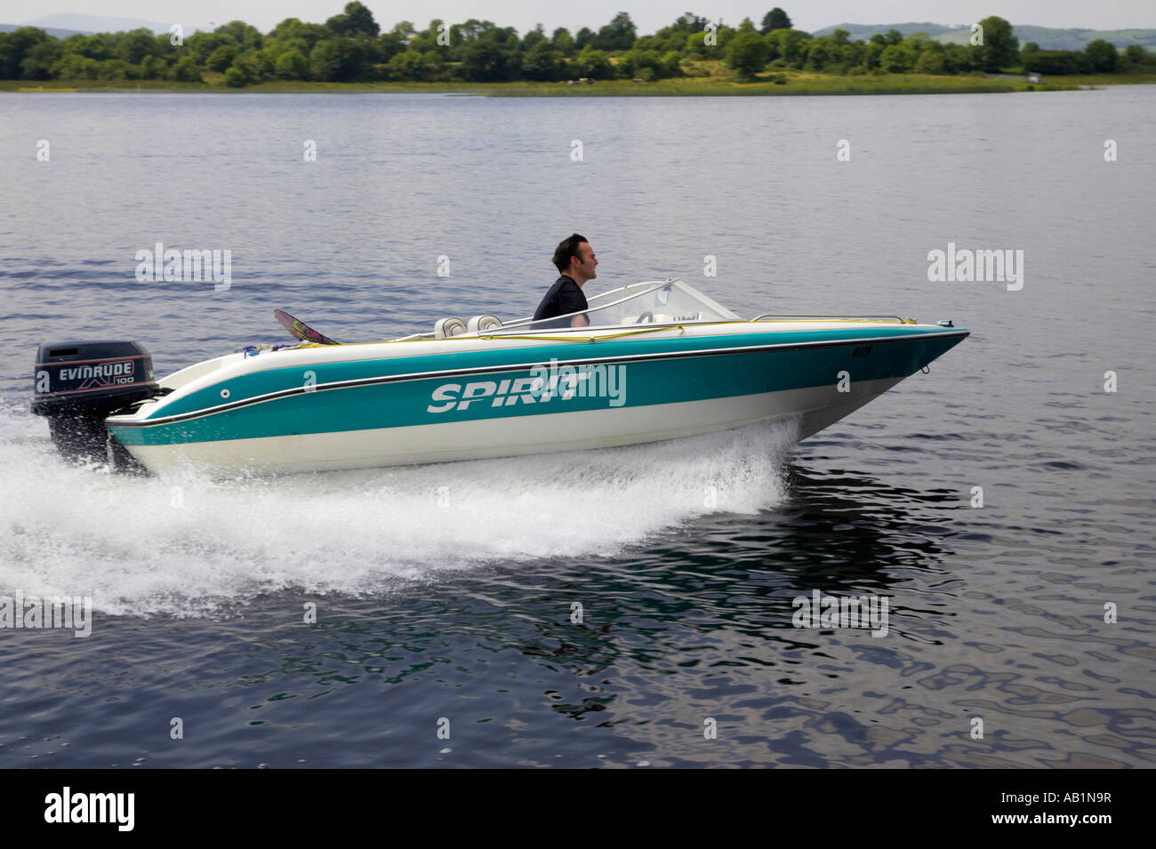 man driving speedboat at speed in lower lough erne county fermanagh ...