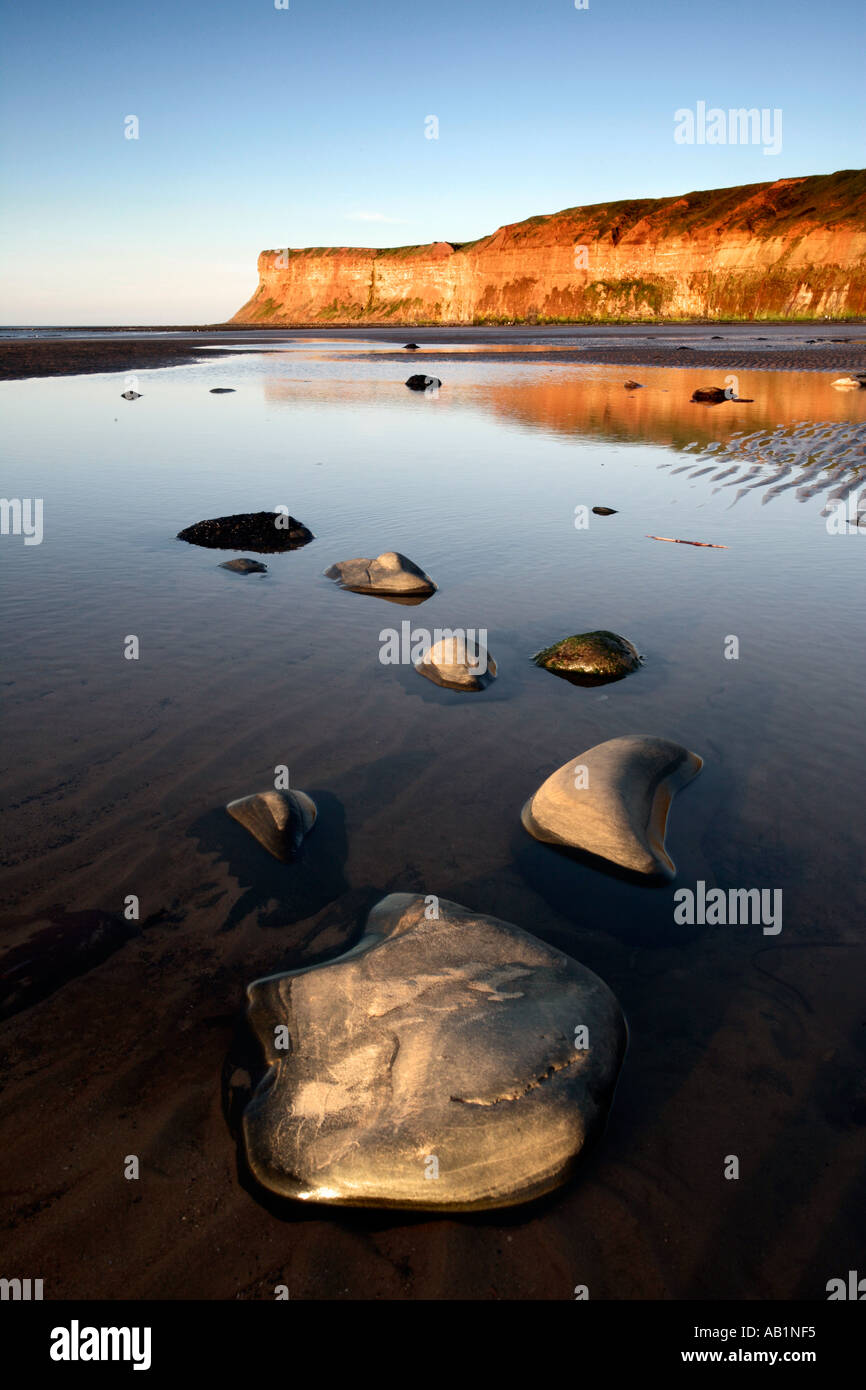 Huntcliffe red iron ore headland at Saltburn with summer sunset ...