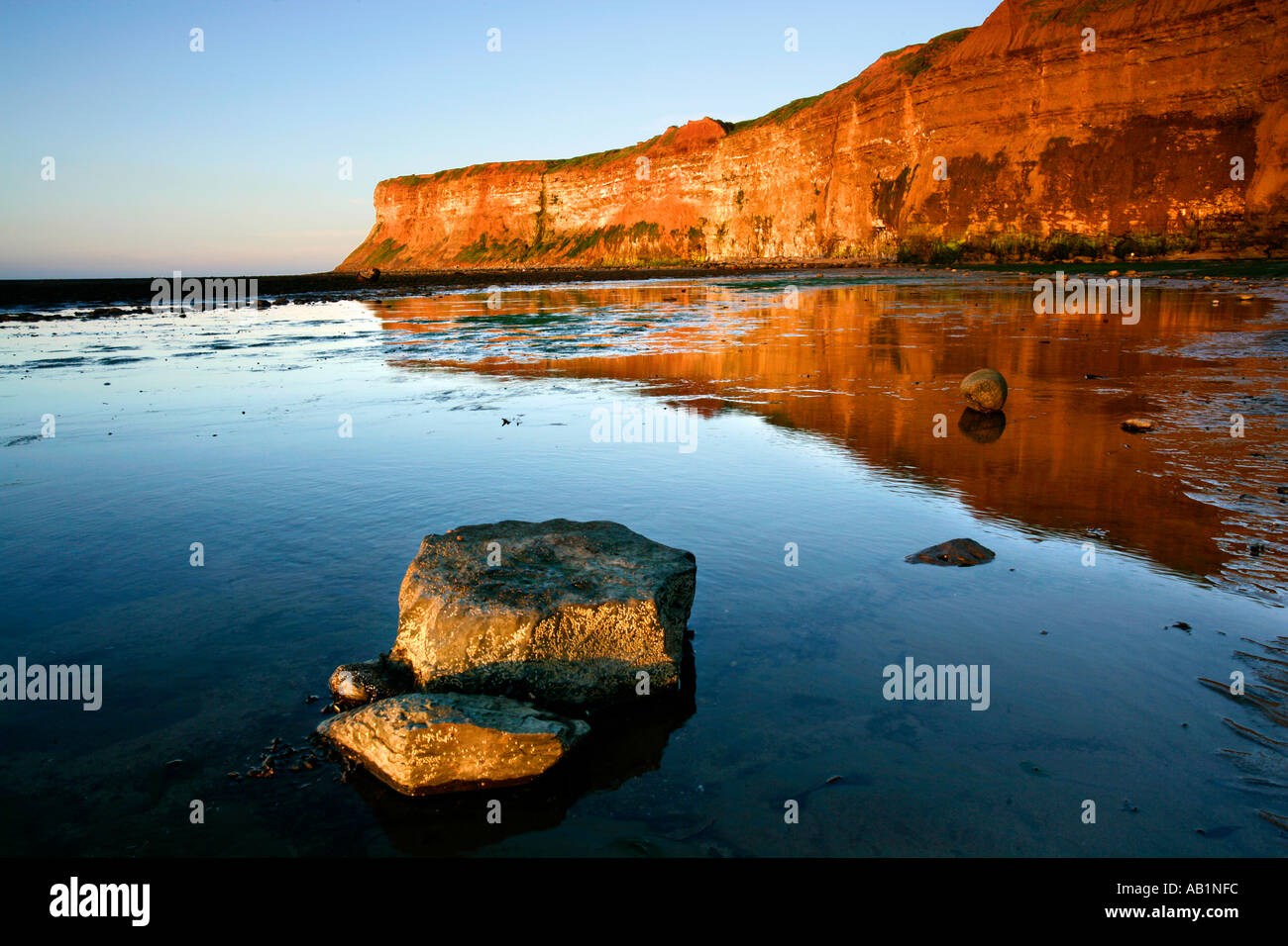 Huntcliffe red iron ore headland at Saltburn with summer sunset ...