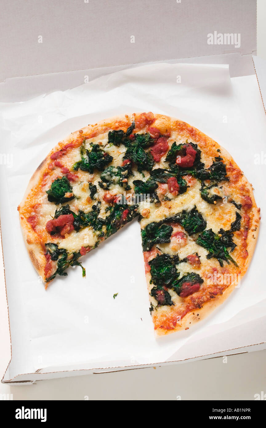 Spinach tomato and cheese pizza in pizza box FoodCollection Stock Photo ...