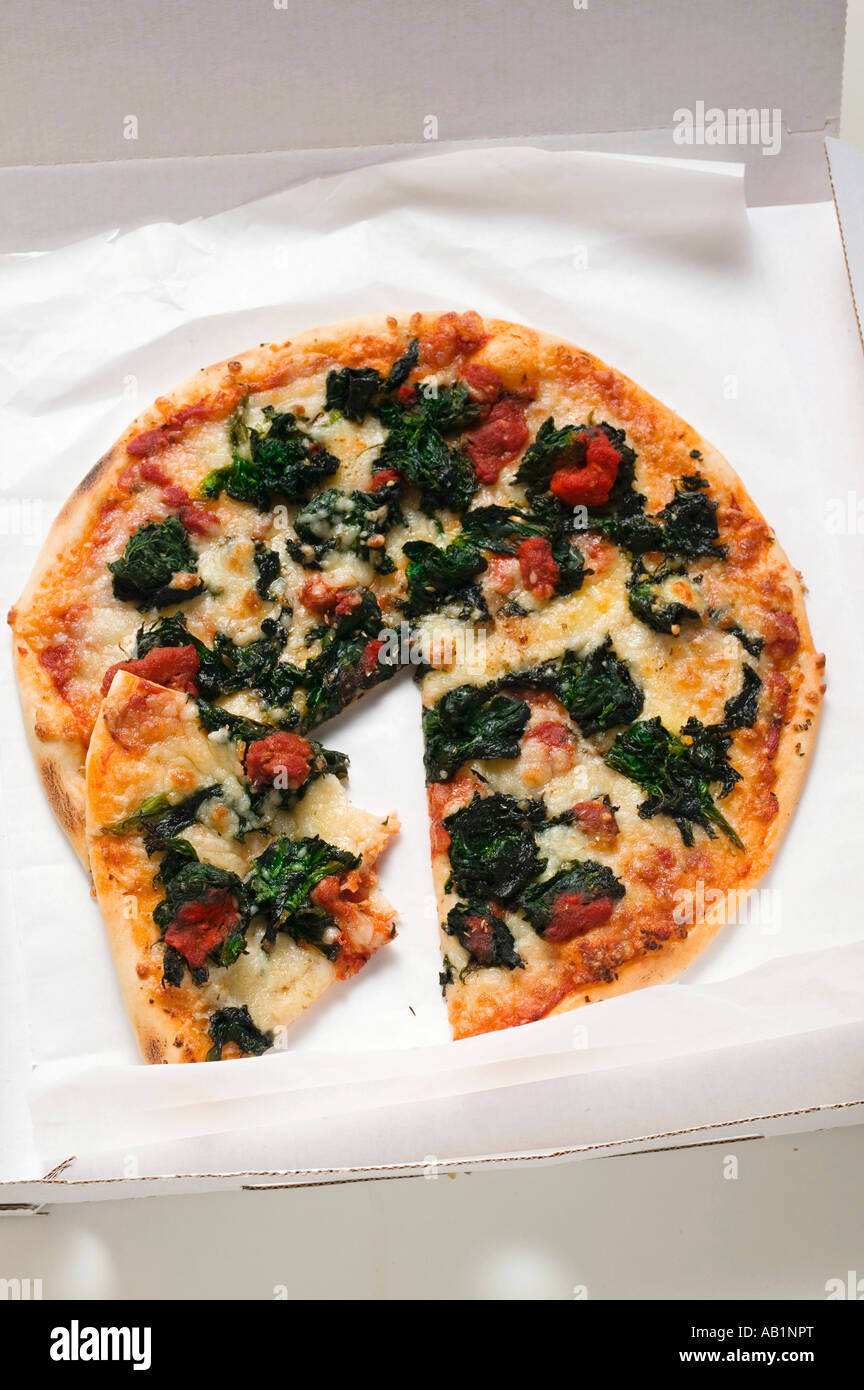 Spinach tomato and cheese pizza in pizza box FoodCollection Stock Photo ...