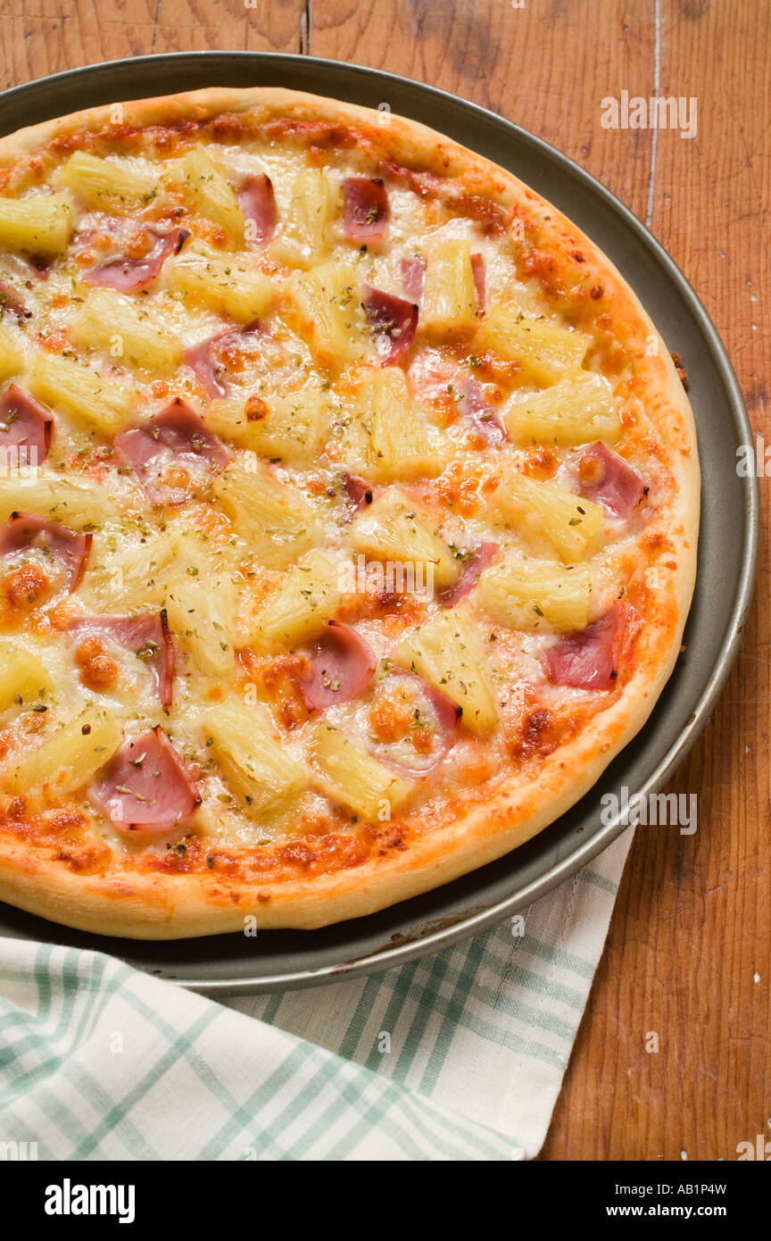 Hawaiian pizza with ham and pineapple FoodCollection Stock Photo - Alamy
