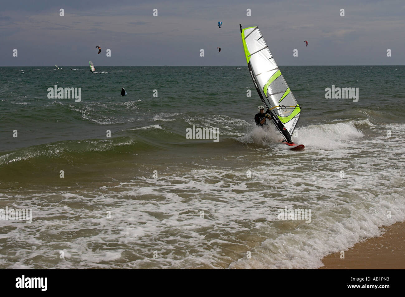 Sailboarding is popular off the beach at Mui Ne Vietnam Stock Photo - Alamy
