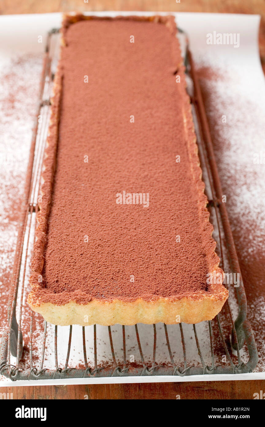 Rectangular chocolate tart with cocoa powder FoodCollection Stock Photo ...