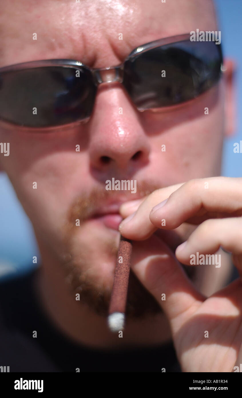 Man smoking camel cigarettes hi-res stock photography and images - Alamy