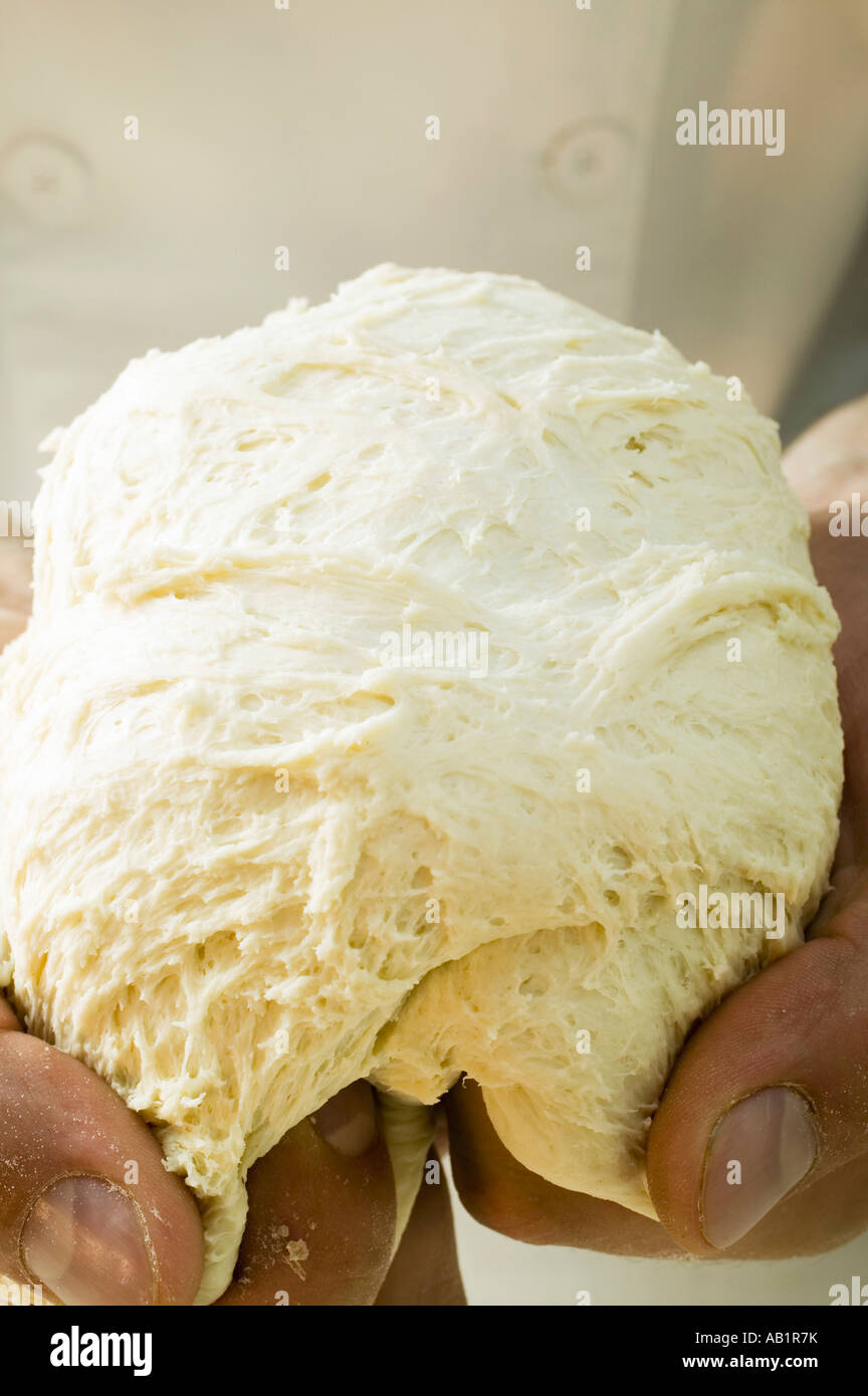 Kneading pizza dough close up FoodCollection Stock Photo - Alamy
