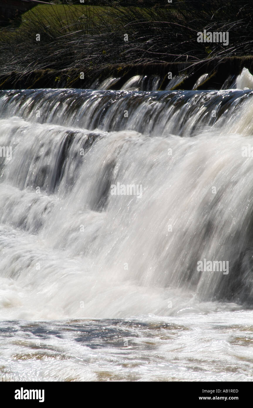 Turbulent water flowing over a weir splash spray relaxing sound of ...