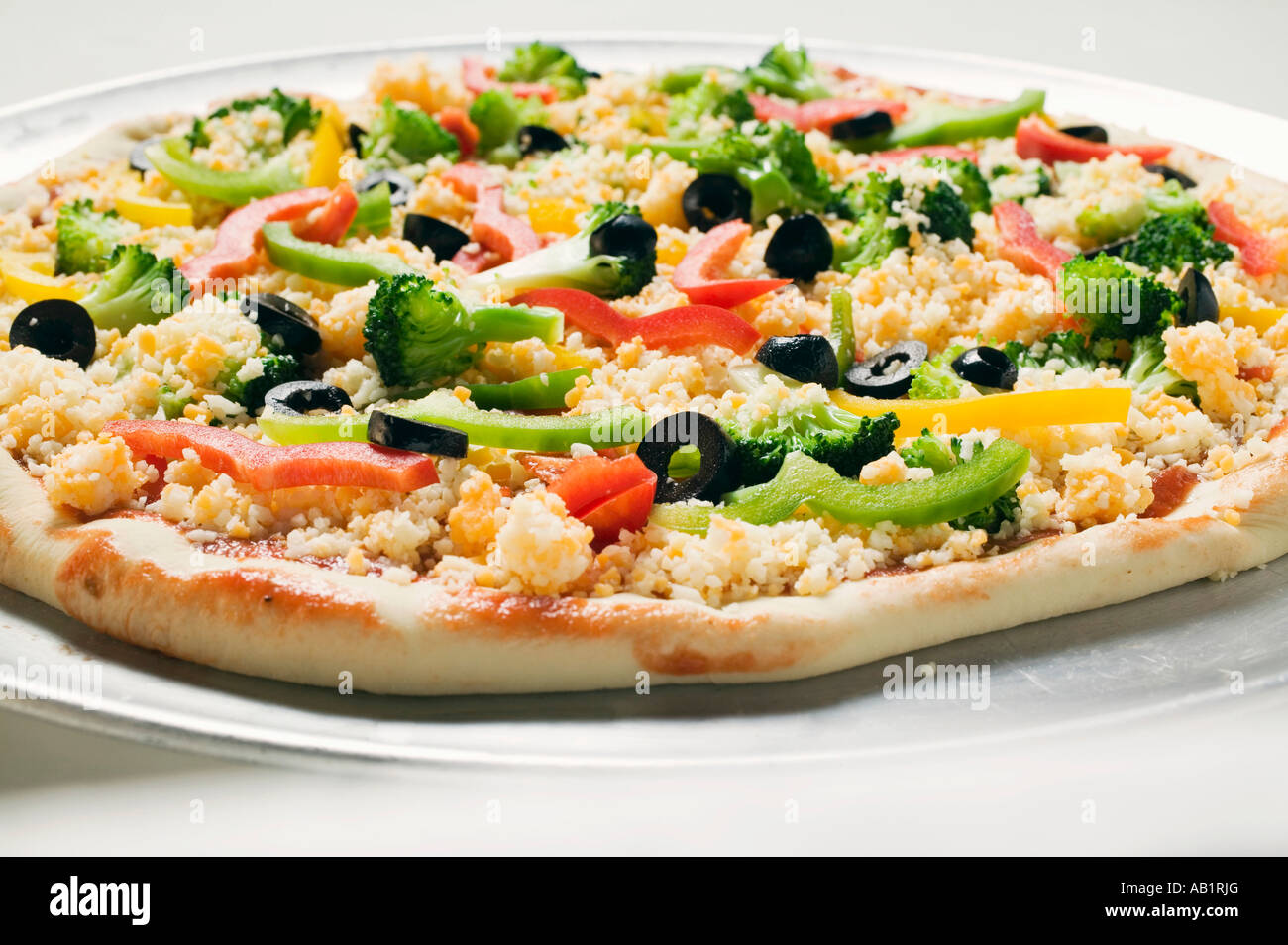 Vegetable pizza unbaked FoodCollection Stock Photo - Alamy