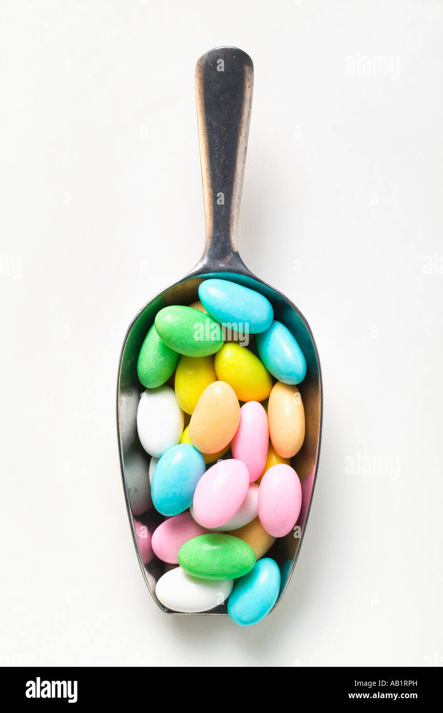 Coloured sugared almonds in small scoop FoodCollection Stock Photo - Alamy