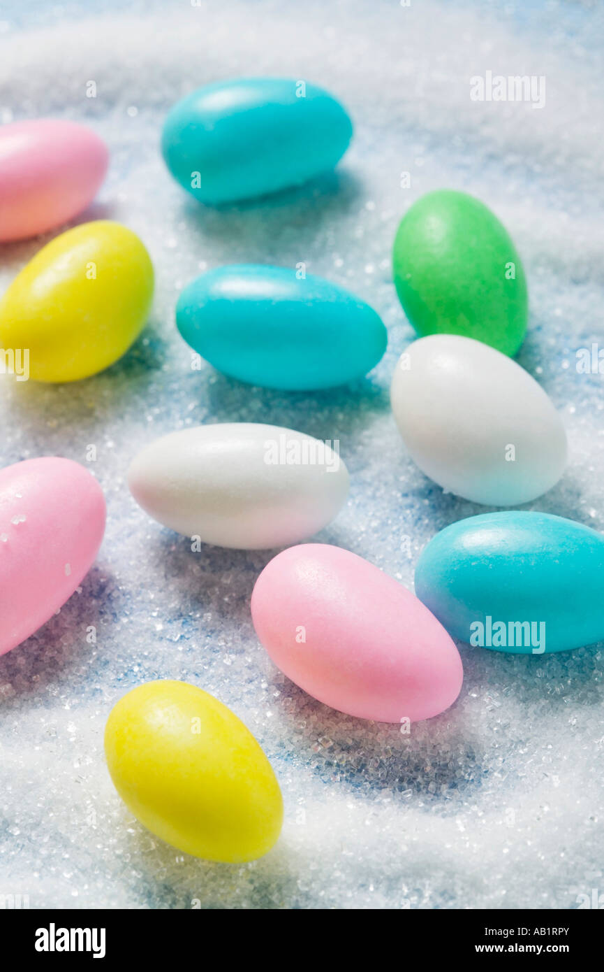 Coloured sugared almonds on sugar FoodCollection Stock Photo - Alamy