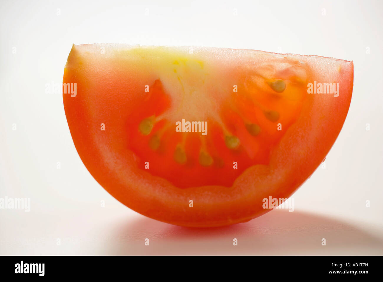 A tomato wedge FoodCollection Stock Photo - Alamy