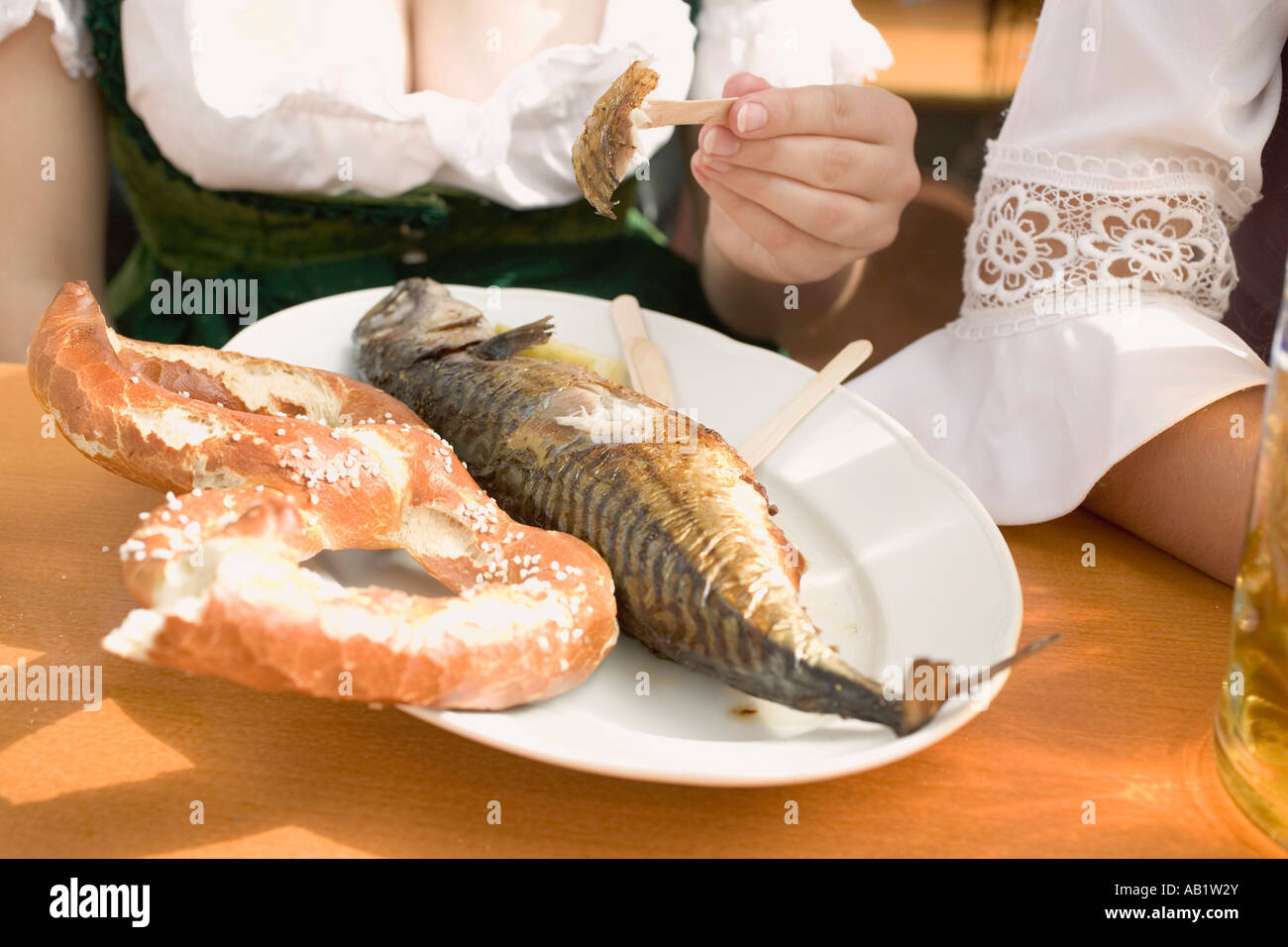 Steckerlfisch fish on stick pretzel Oktoberfest Munich FoodCollection ...