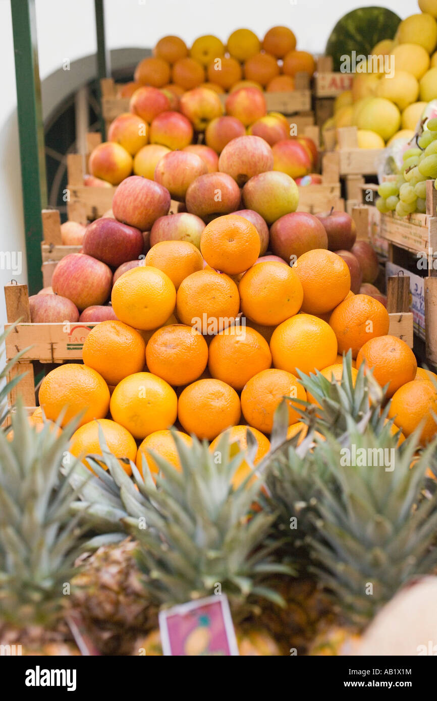 Fruit stall with oranges pineapples and apples FoodCollection Stock ...