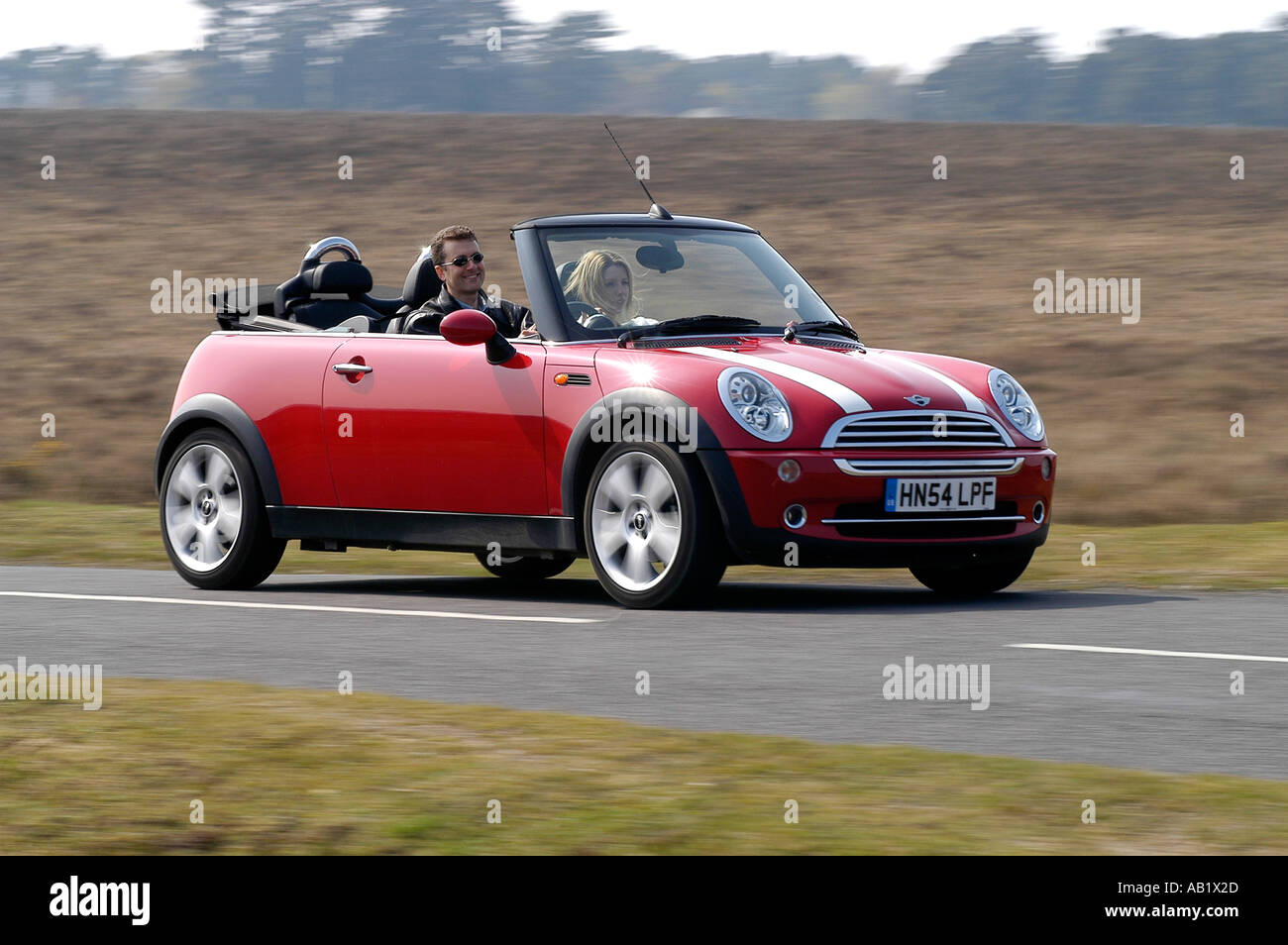 Red convertible driving hi-res stock photography and images - Alamy