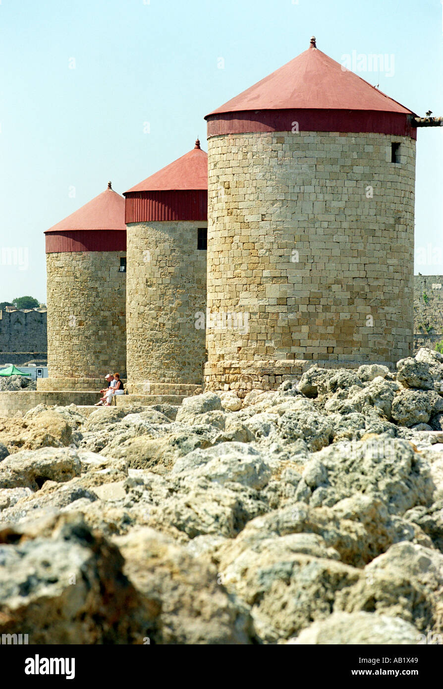 Traditional old stone windmills at Rhodes Town harbour Greek Islands ...