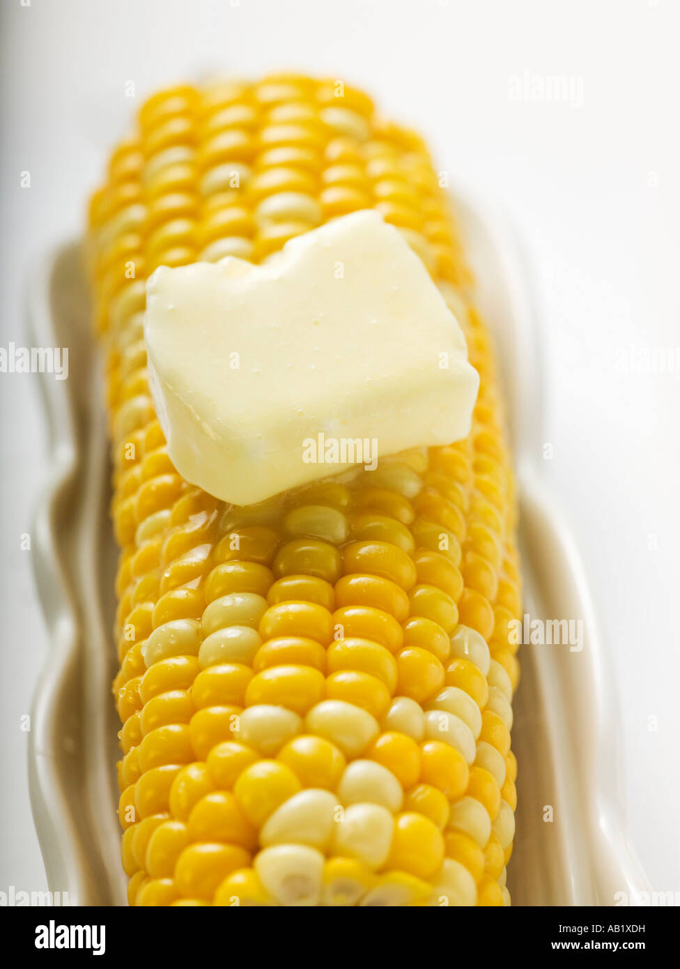 Corn cob with knob of melting butter FoodCollection Stock Photo - Alamy