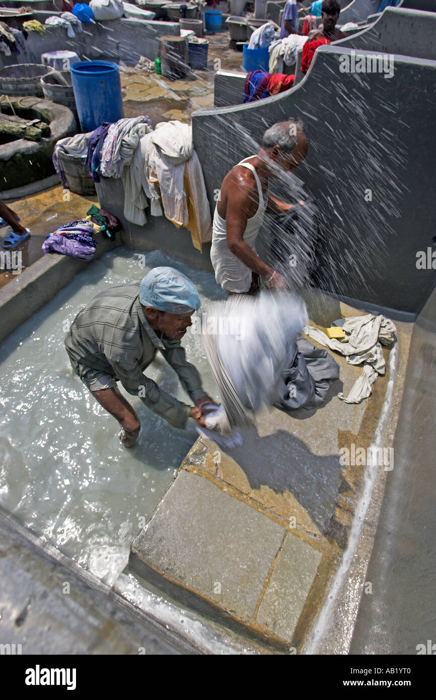 Dhobi wallahs pounding washing at dhobi ghats outdoor laundry Banganga ...