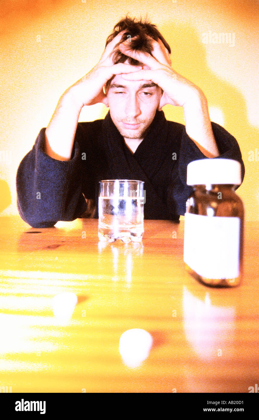 Man about to take medication Stock Photo - Alamy