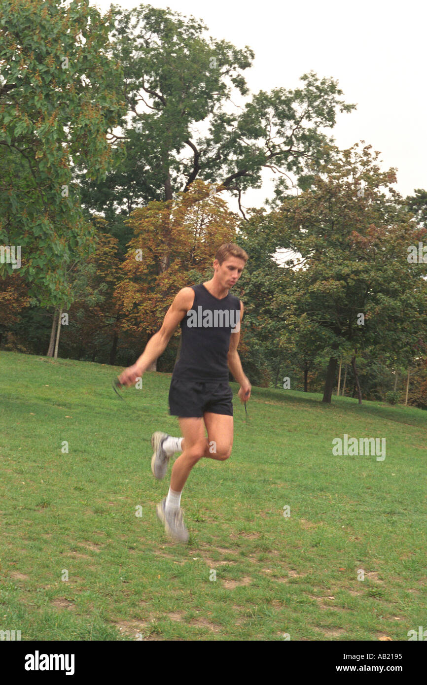 Sporty man jumping on skipping hi-res stock photography and images - Alamy