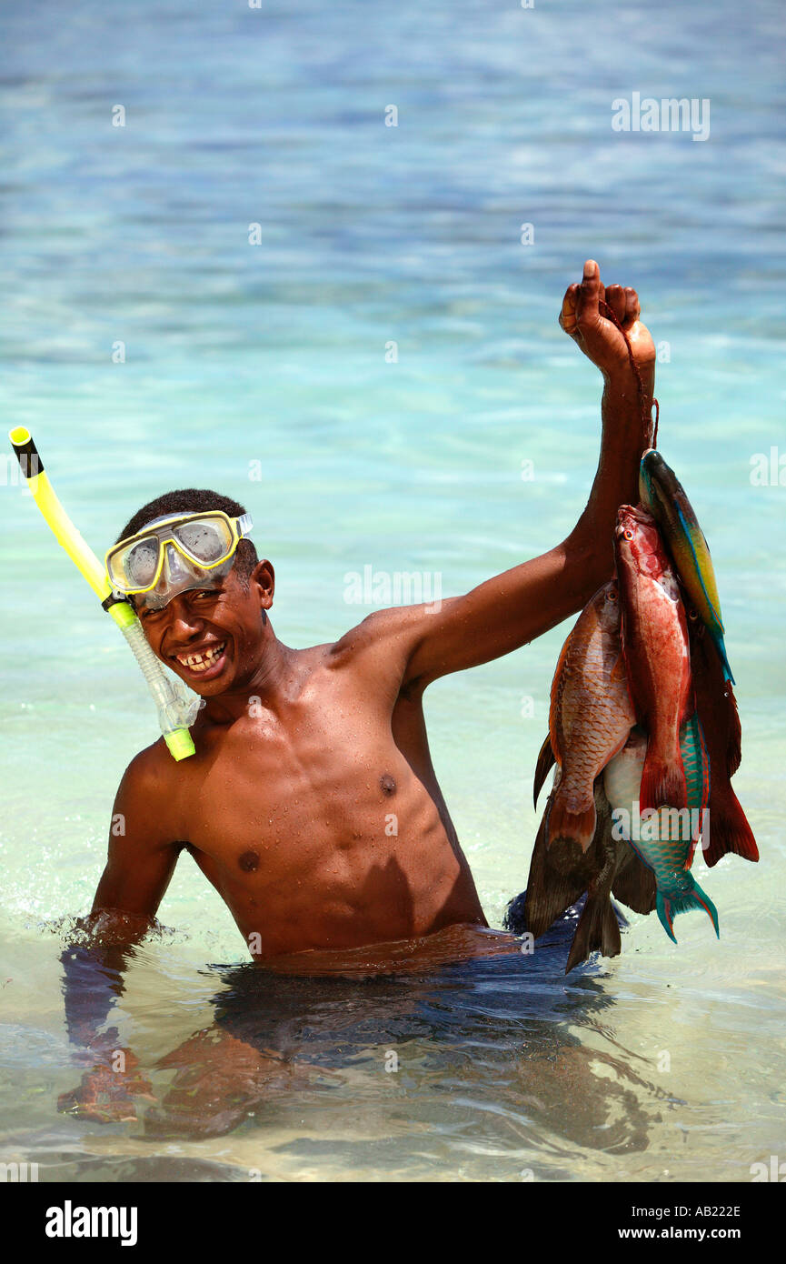 Young Fijian boy with Fish Yasawa Islands Fiji Model release 364 Stock ...