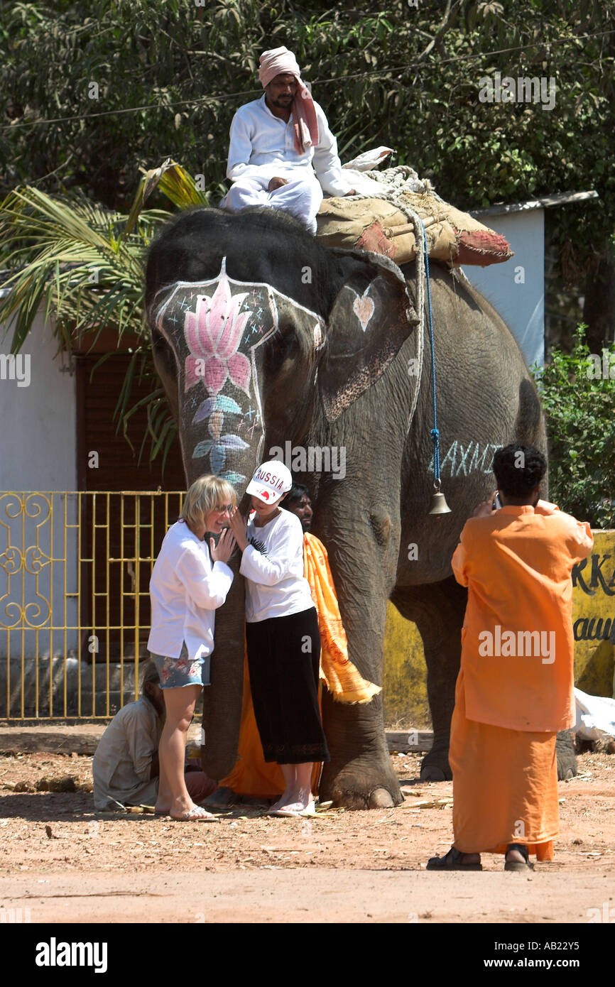 Visitors being photographed with decorated elephant Goa India Stock ...