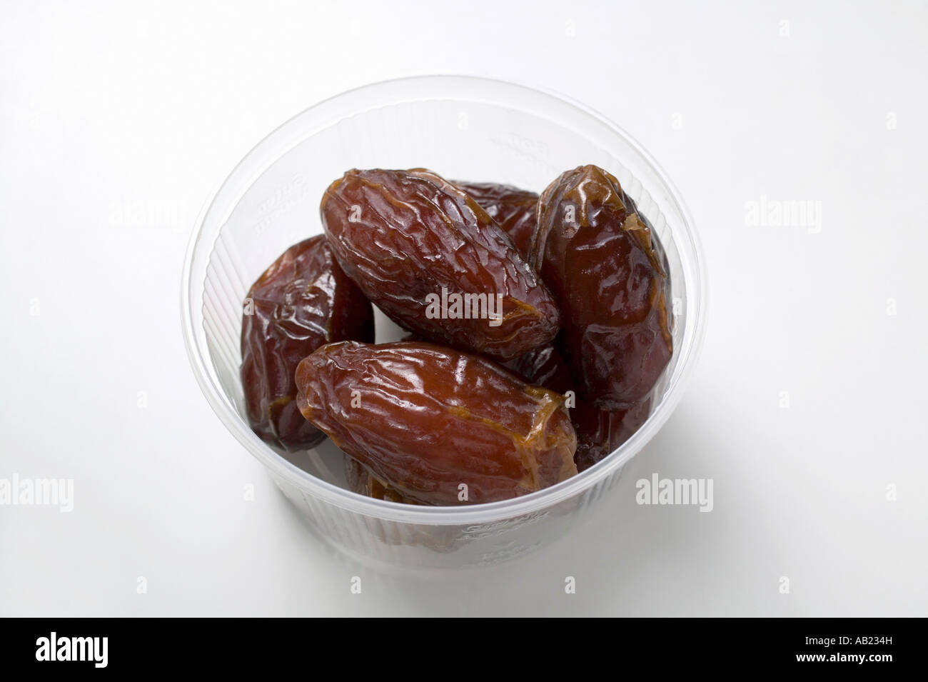 Dried dates in plastic dish FoodCollection Stock Photo - Alamy