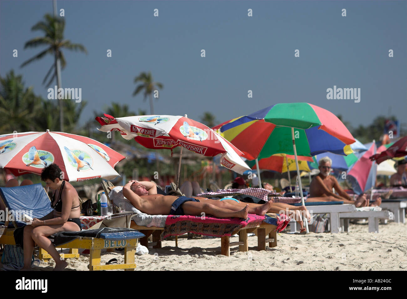 Holidaymakers sunbathing Benaulim Beach Goa India Stock Photo - Alamy