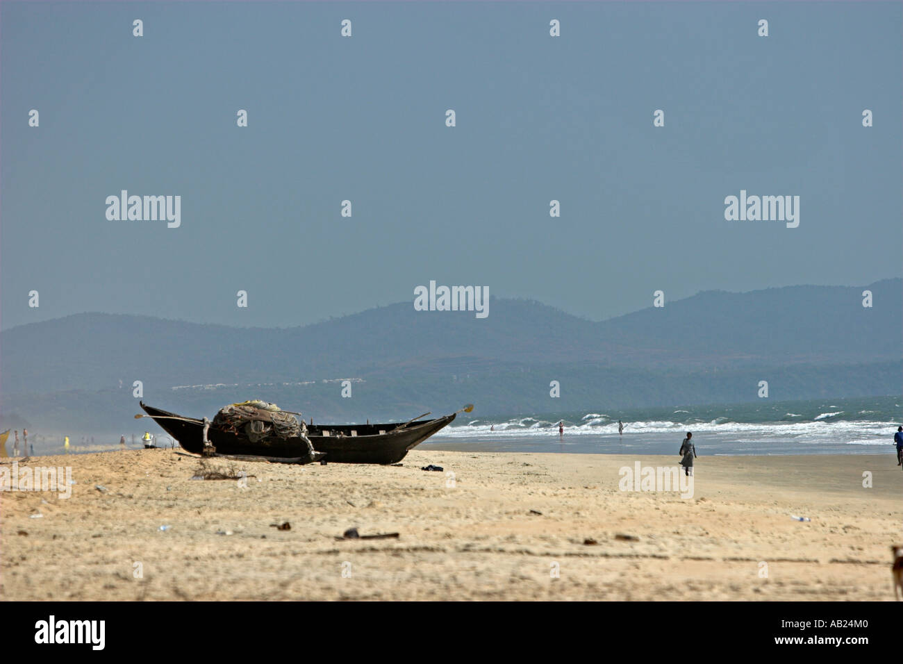 Open outrigger fishing boat on empty Varca Beach Goa India Stock Photo ...