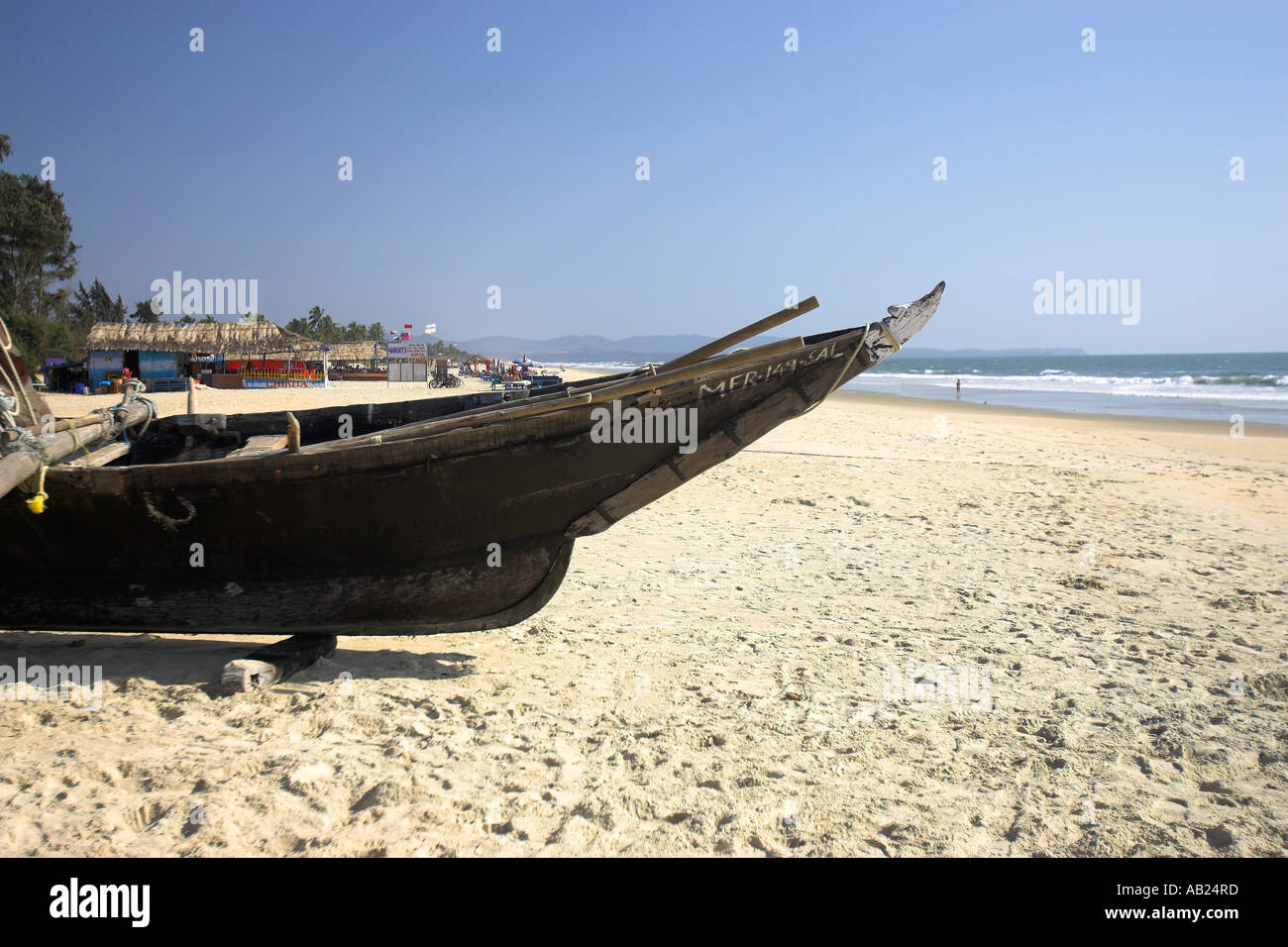 Open outrigger fishing boat Fatrade Beach south Goa India Stock Photo ...