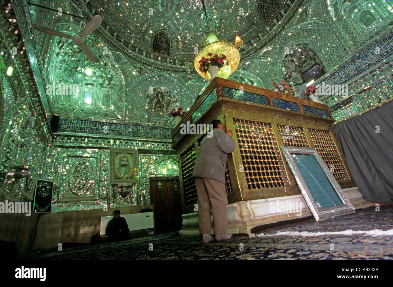 Man worshipping in Shia mosque, Tehran, Iran, Middle East Stock Photo ...