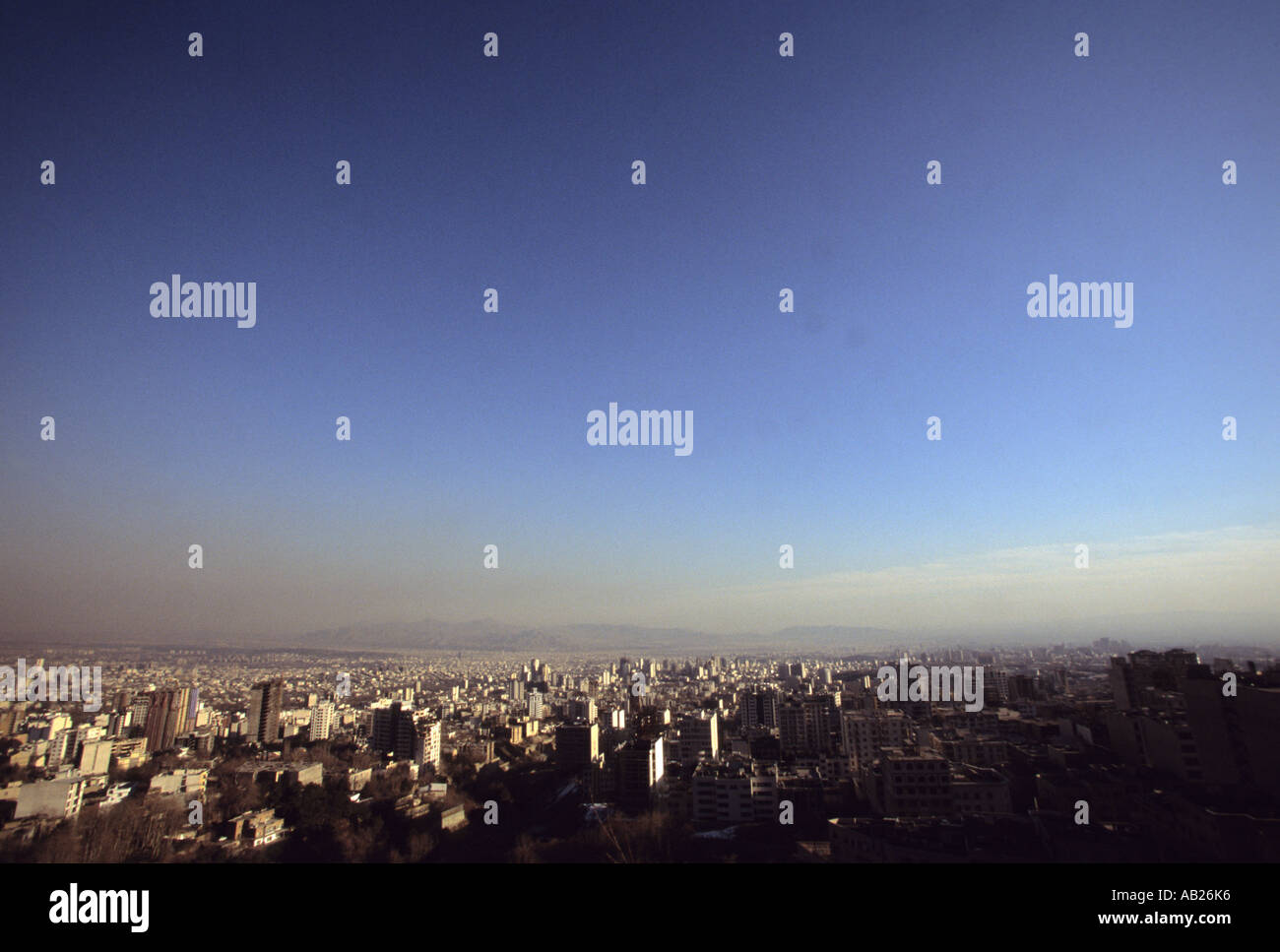 Tehran cityscape with distant view of mountains on horizon, Iran ...