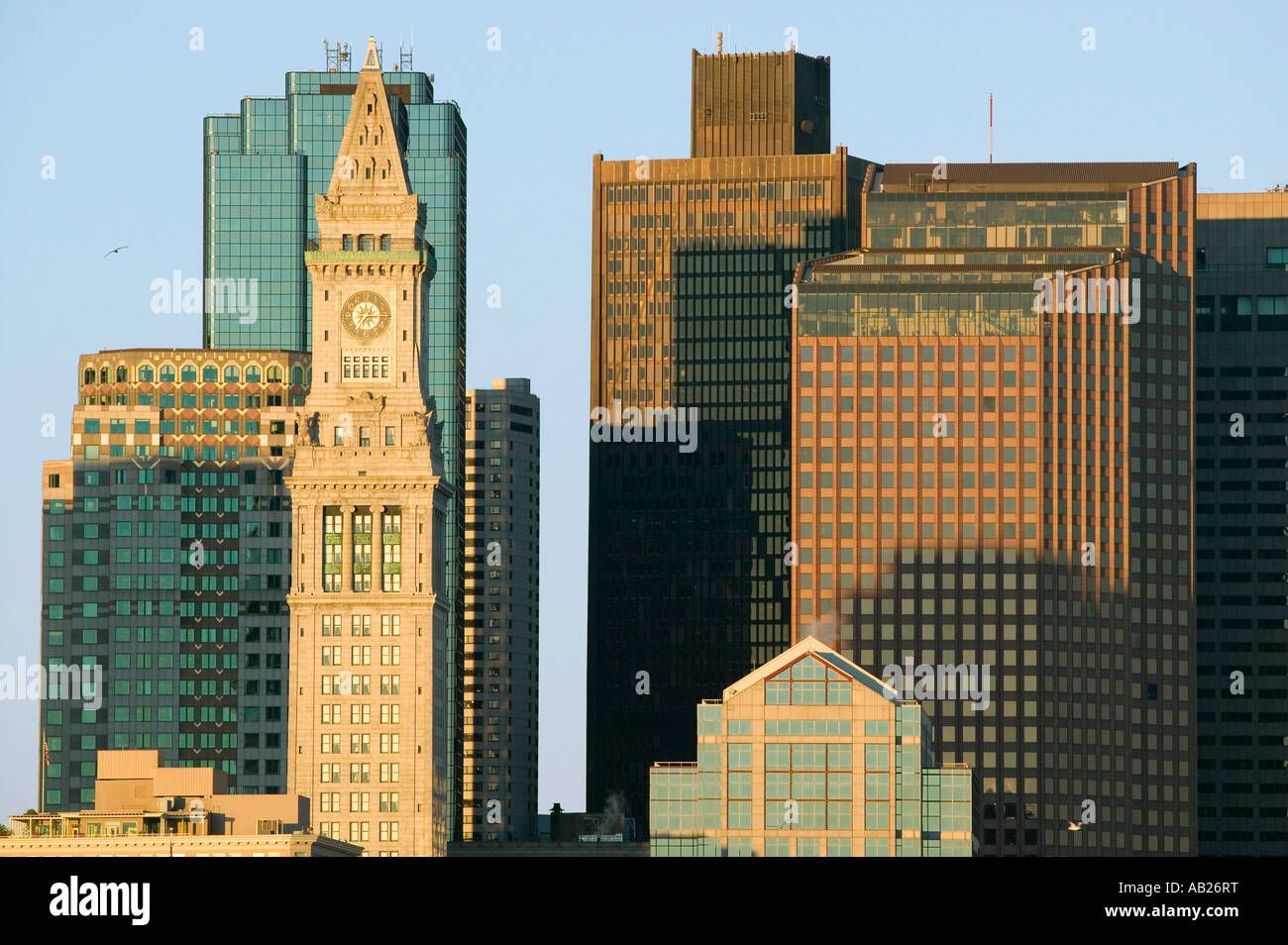 The Customs House Clock Tower and Boston skyline at sunrise as seen ...