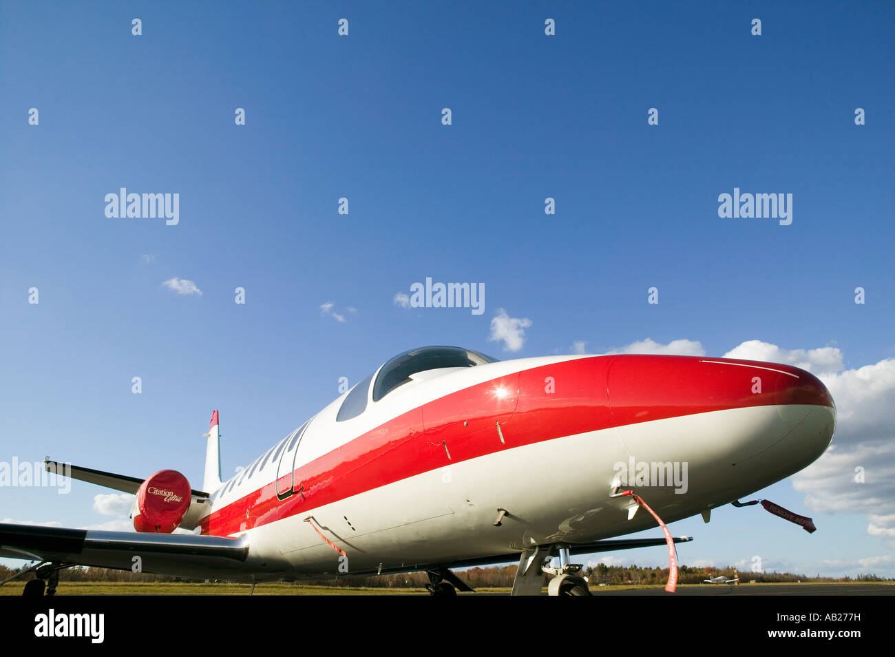 Nose of private jet on runway in Maine Stock Photo - Alamy