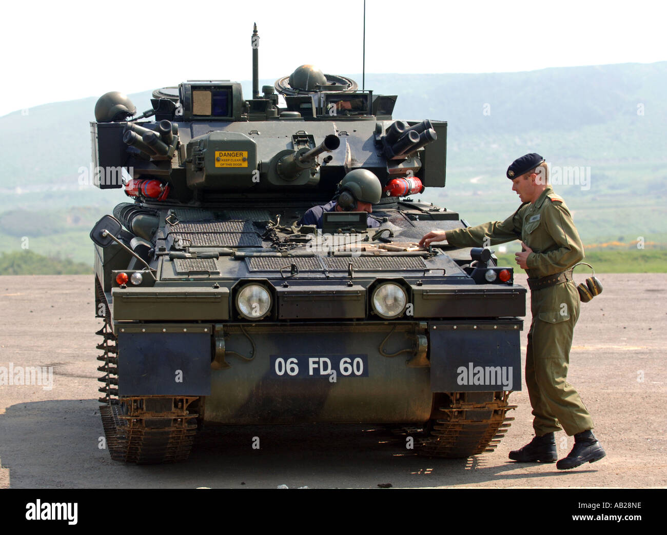 Tank driver and Scimitar tank at "The Armour Centre" at Bovington in ...