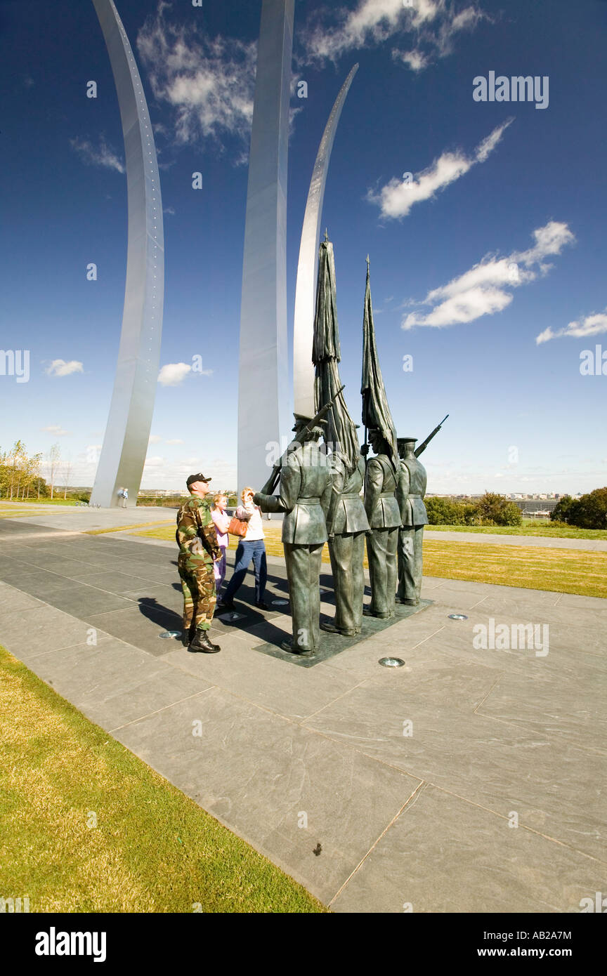Military family look at Bronze Honor Guard and three soaring spires of ...