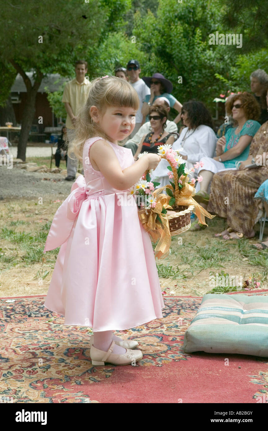 Little girl with basket of flowers at a traditional Jewish wedding in ...